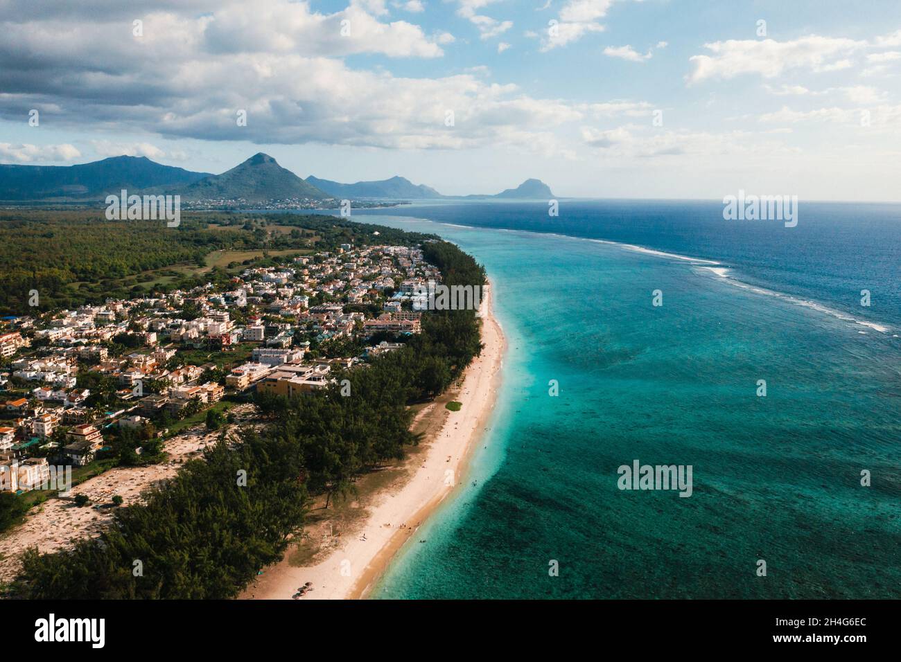 On the beautiful beach of the island of Mauritius along the coast ...