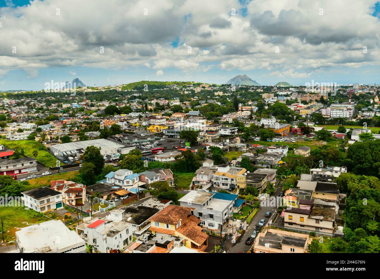 Top view of a town in the jungle of the tropical island of Mauritius, a ...
