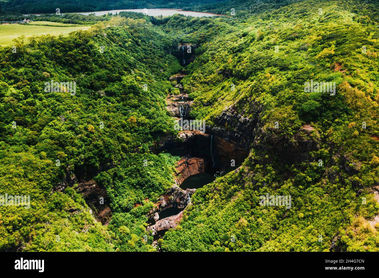 Aerial view from above of the Tamarin waterfall seven cascades in the ...