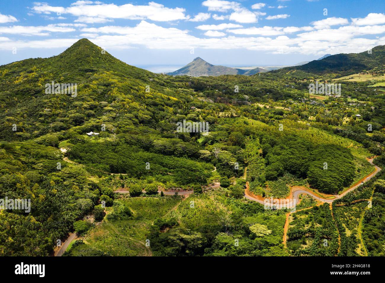 Bird's-eye view of the mountains and fields of the island of Mauritius ...