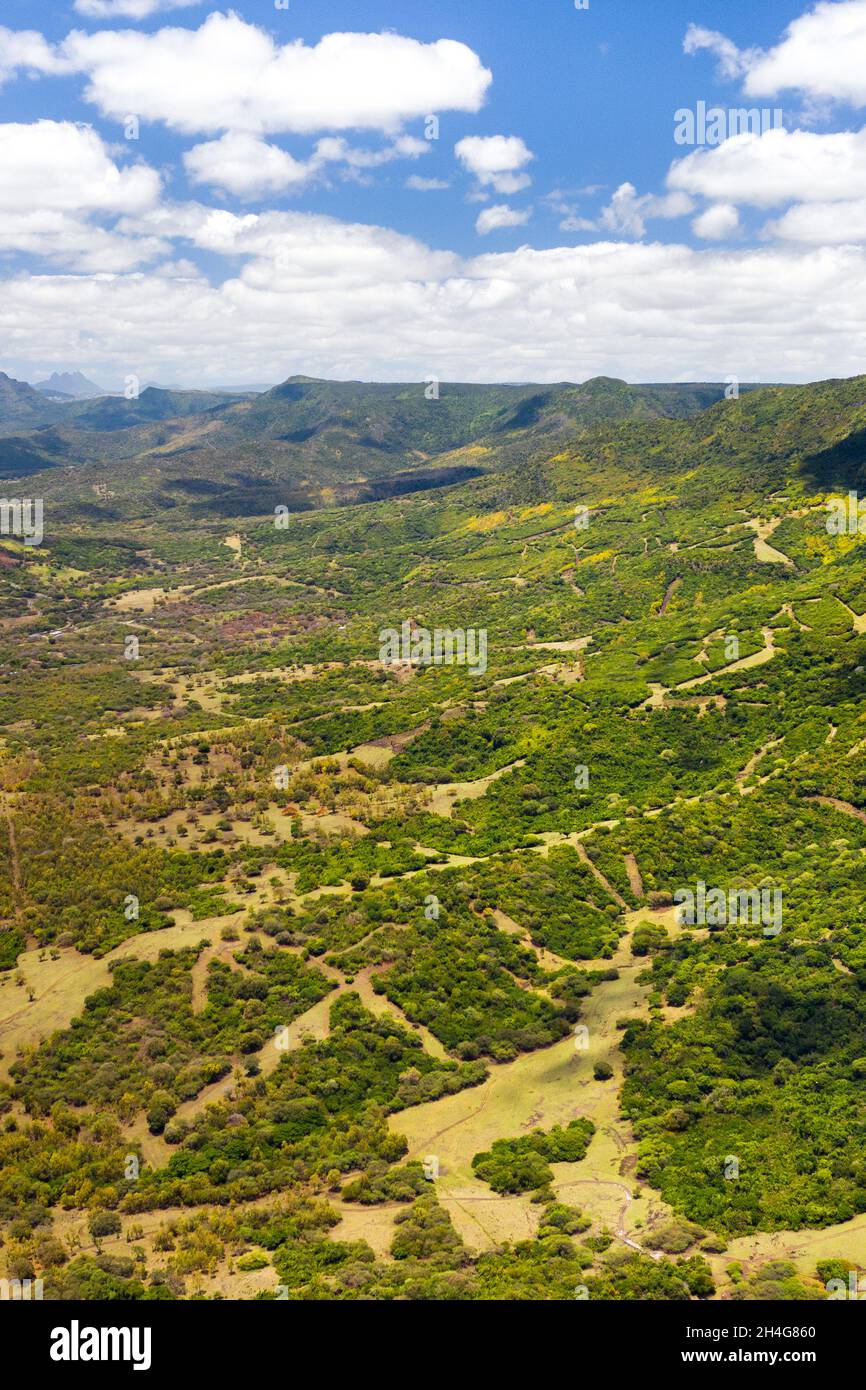 Bird's-eye view of the mountains and fields of the island of Mauritius ...
