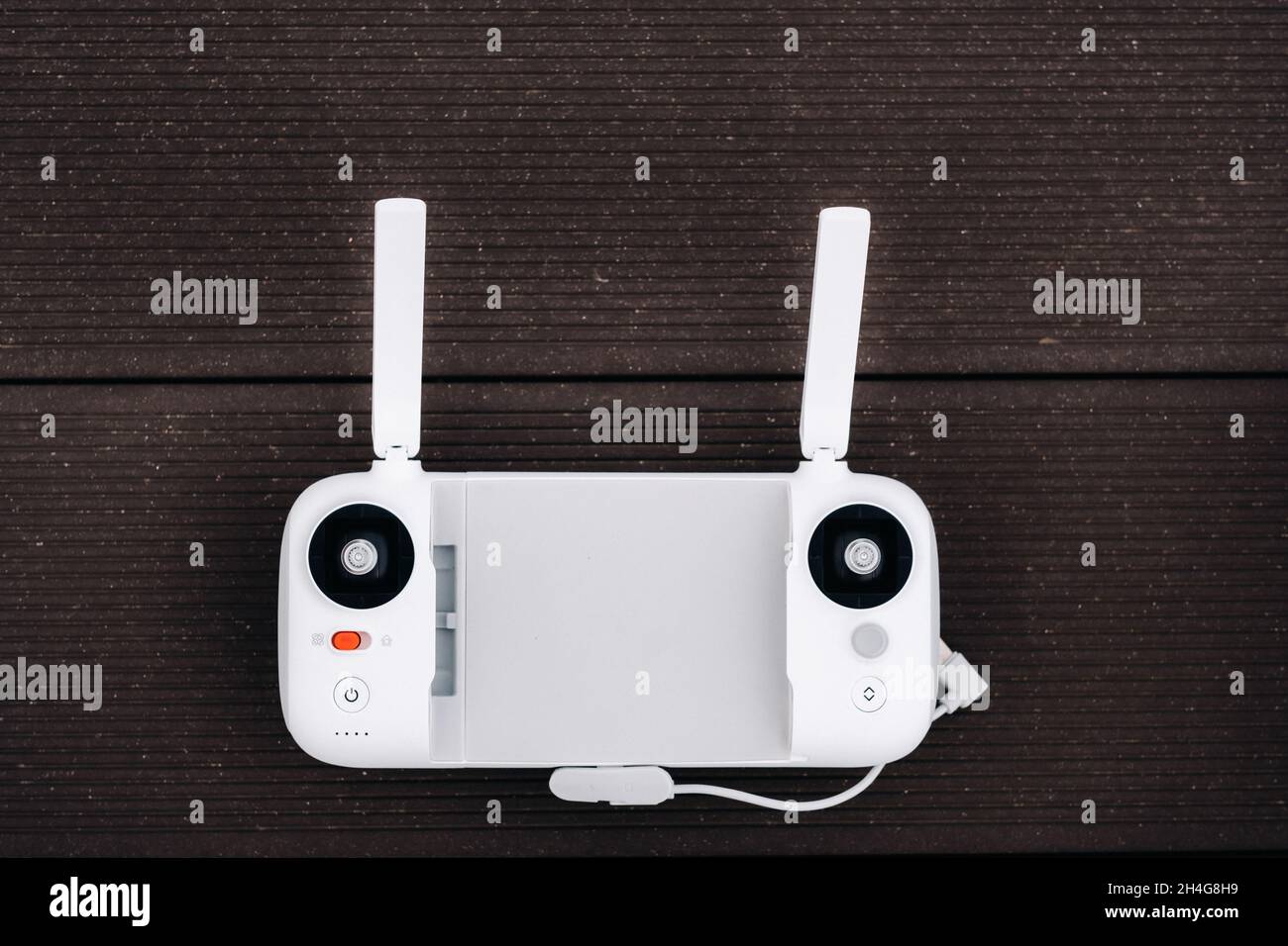 The remote control quadcopter white color.flight controller on an old ...