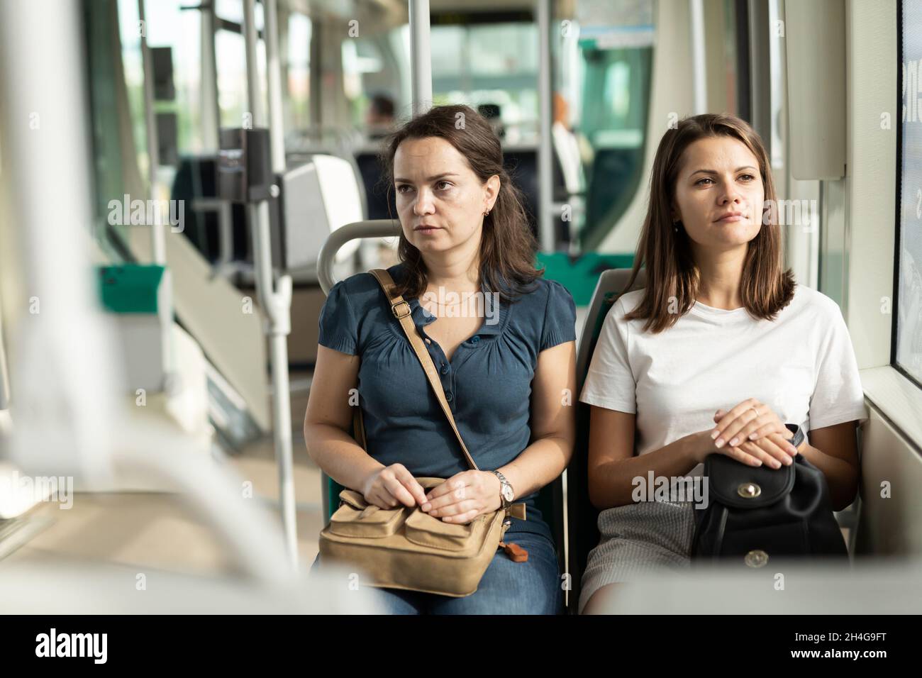 Passengers ride together on a bus or tram Stock Photo - Alamy