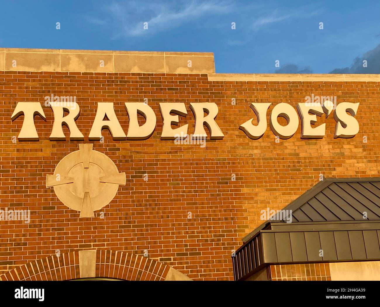 Trader Joe's store facade in golden hour light Stock Photo - Alamy