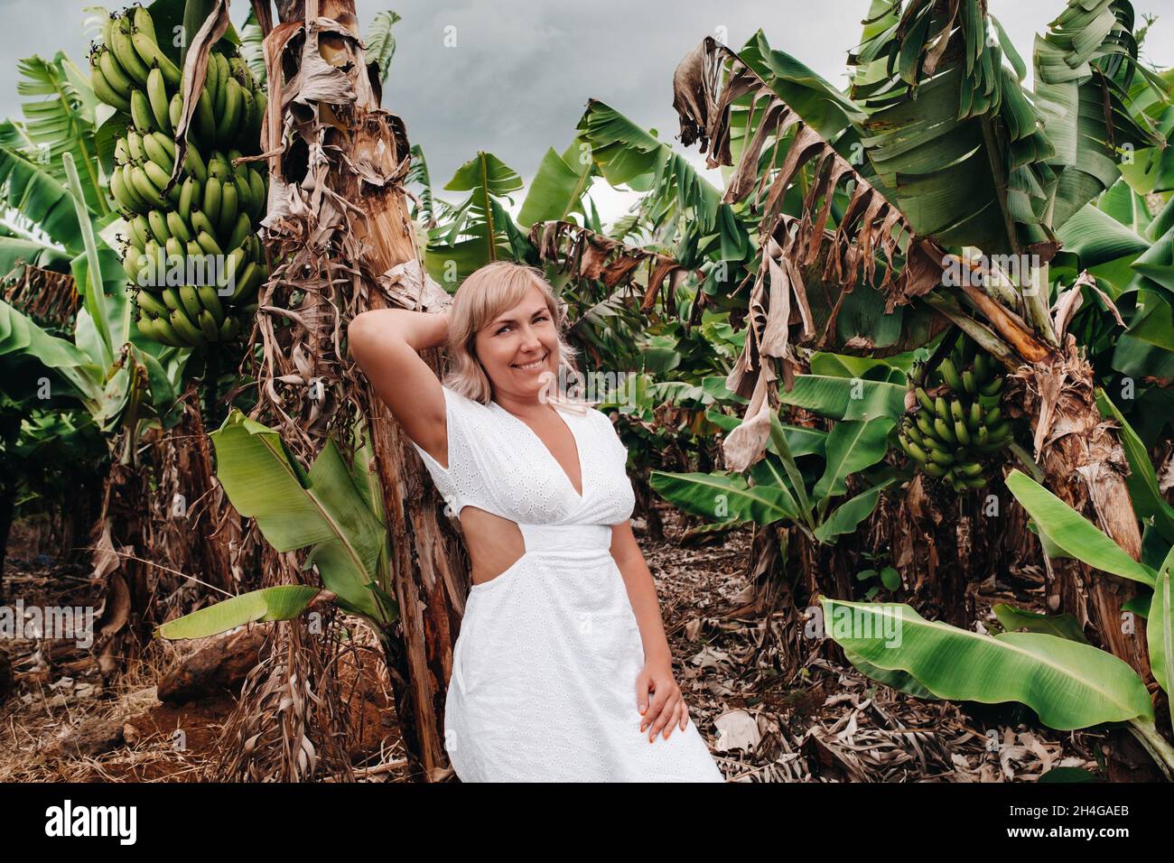 A girl on a banana plantation on the island of Mauritius, a Banana farm ...