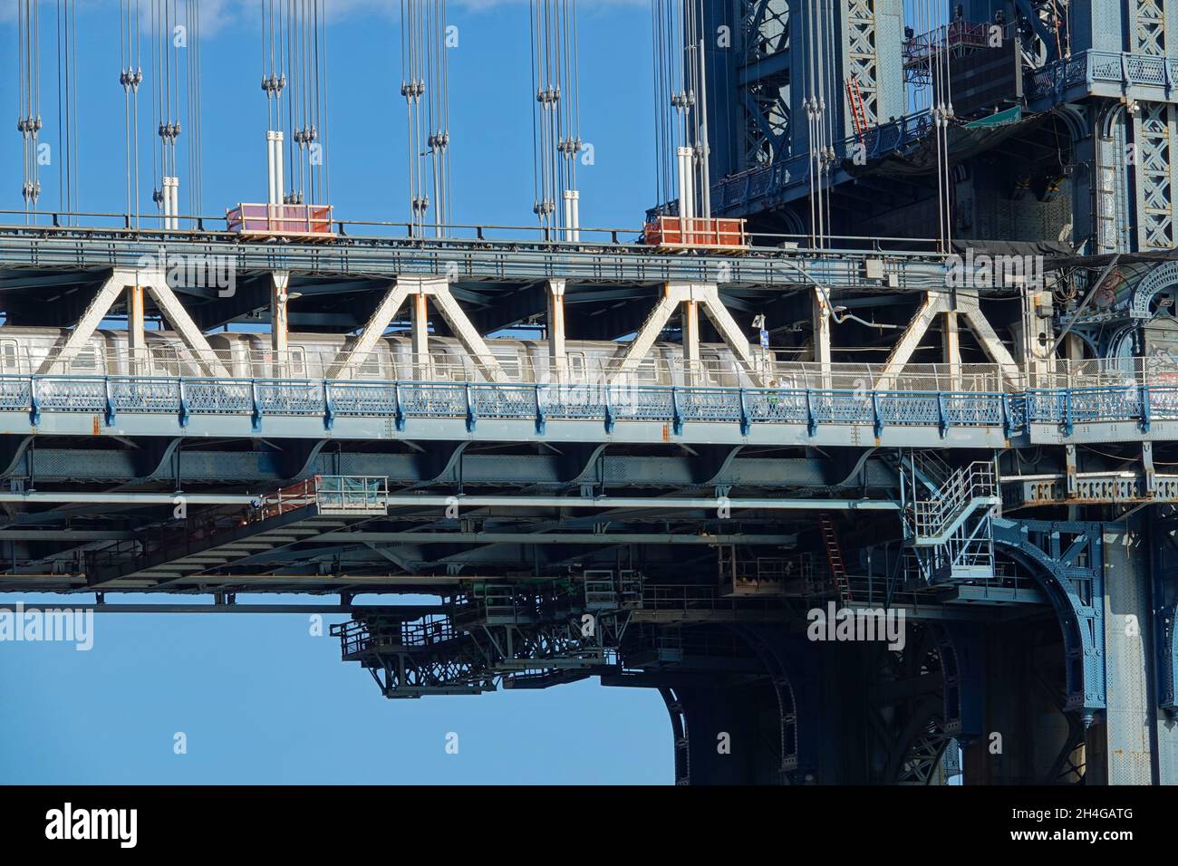 The Brooklyn and Manhattan Bridges are iconic architectural structures ...