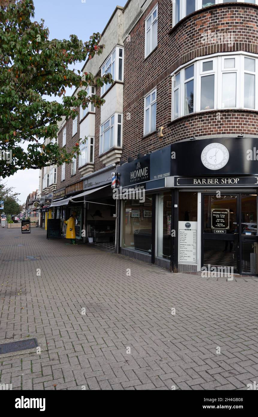 High street shops with apartments above, along Corbets Tey Road in ...