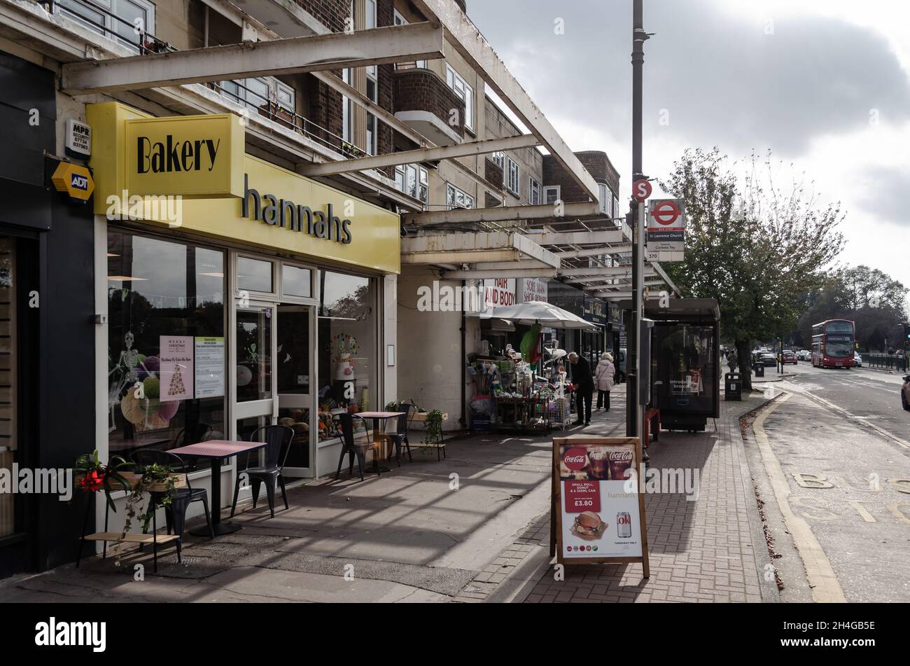 High street shops with apartments above, along Corbets Tey Road in ...