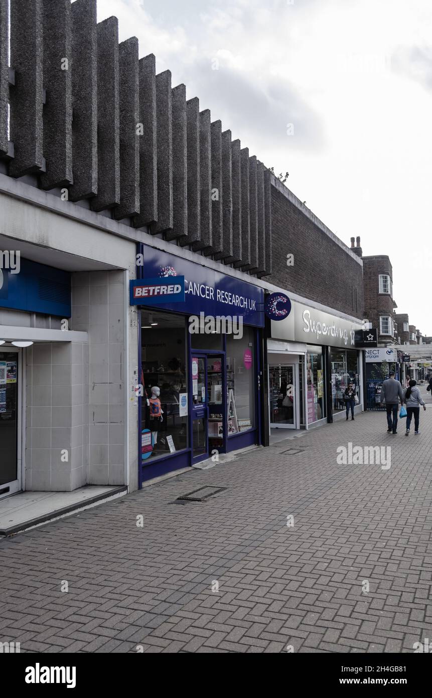 High street shops with apartments above, along Corbets Tey Road in ...
