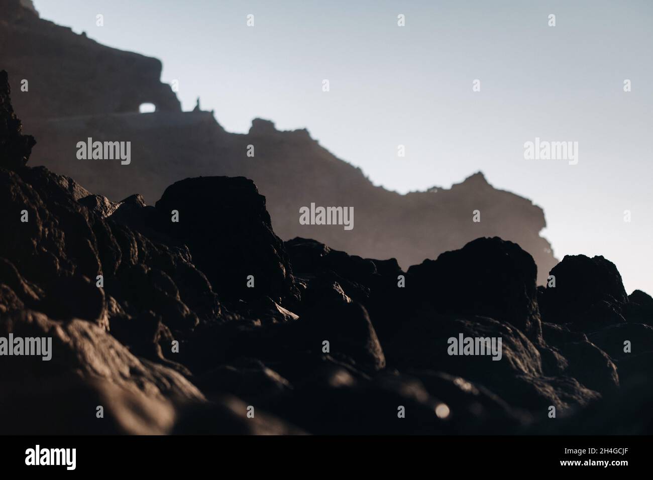 Tunnel through the mountain of Tenerife, Rocks at sunset near the ...