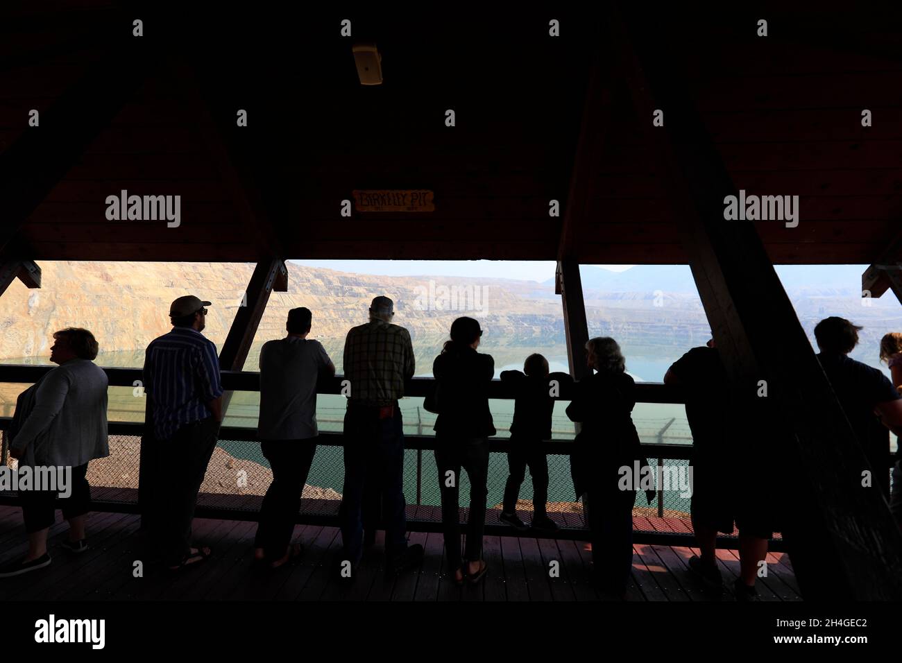 Visitors at viewing platform looking at Berkeley Pit, an open pit ...
