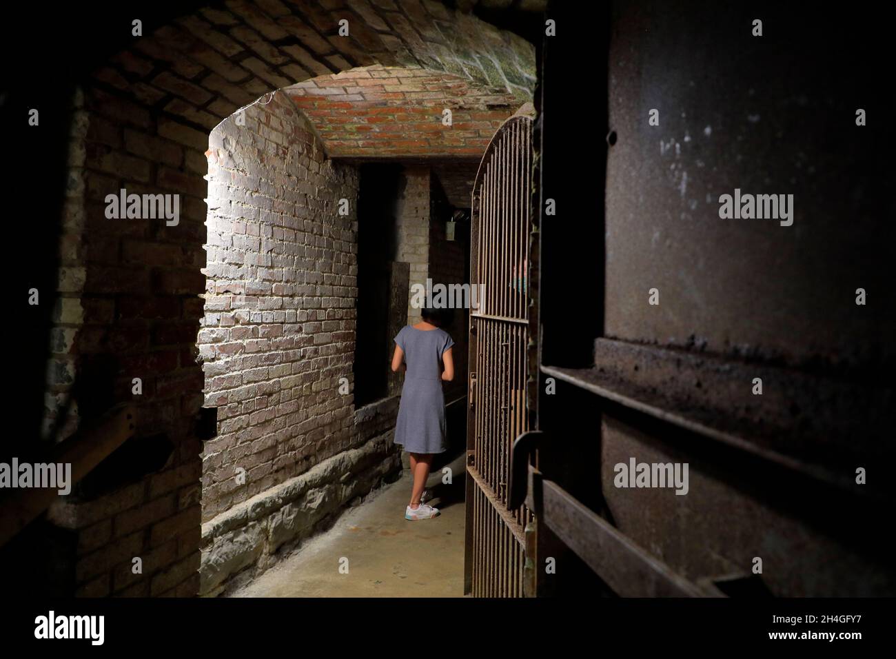 A visitor from Underground Seattle tour in underground passageway of ...
