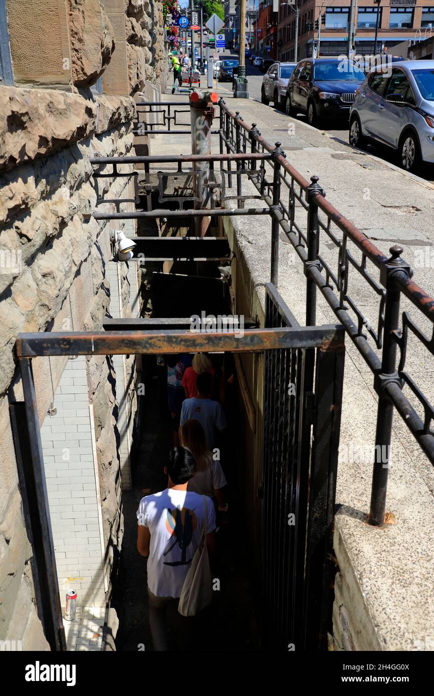 Visitors enter Seattle Underground a network of underground passageways ...