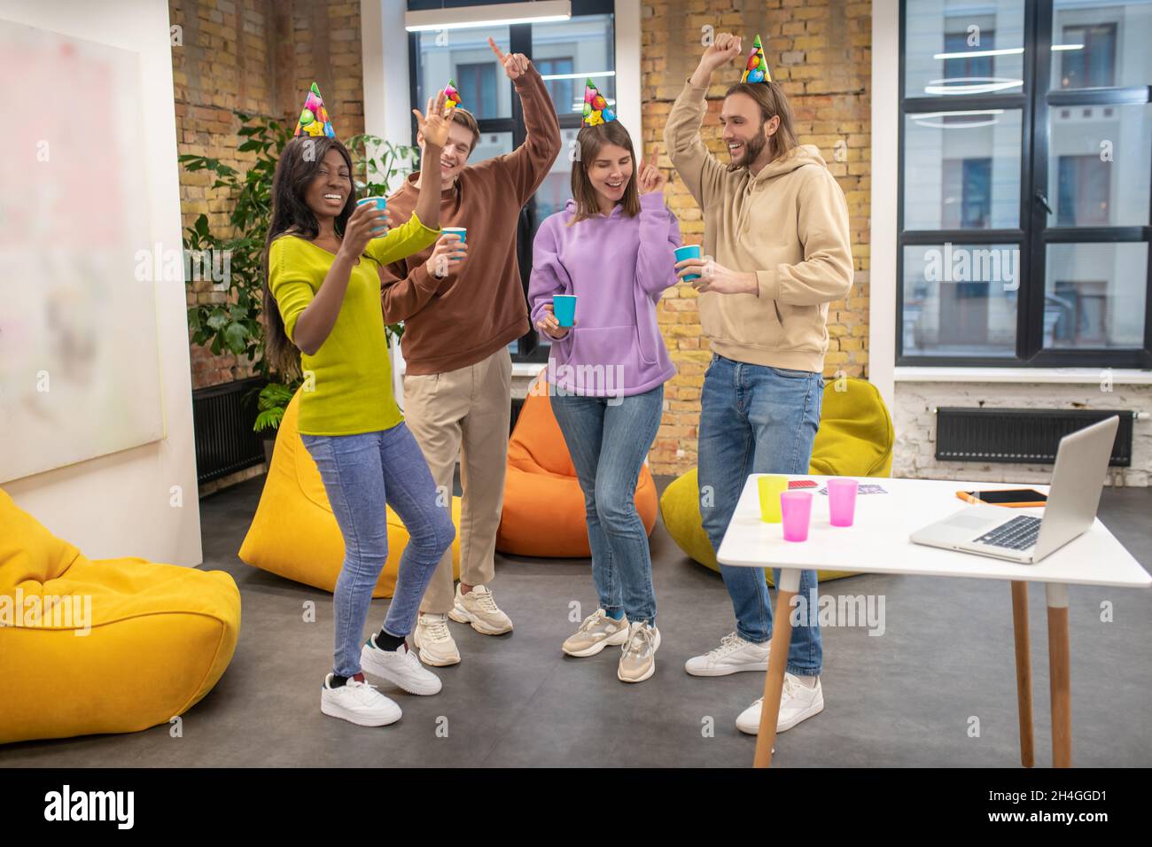 Group young colleagues celebrating hi-res stock photography and images ...