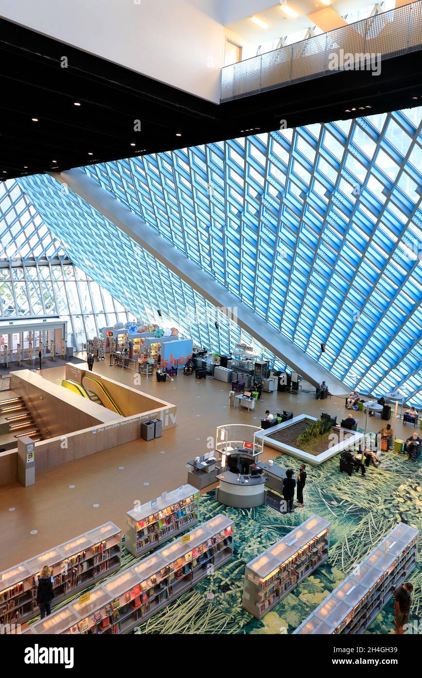 Interior view of Seattle Central Library with sloped glass roof ...