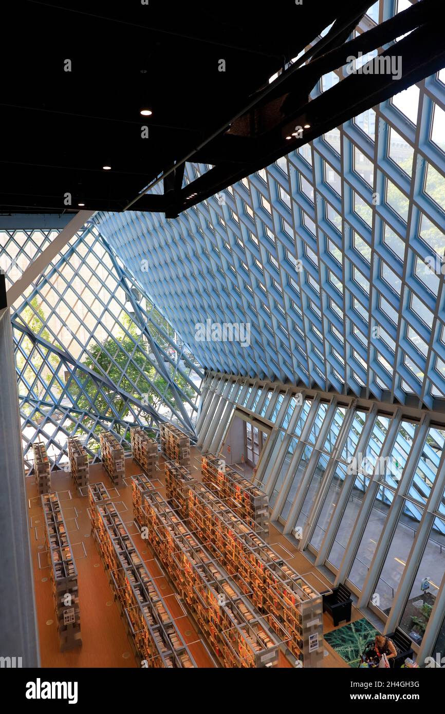 Interior view of Seattle Central Library with sloped glass roof ...
