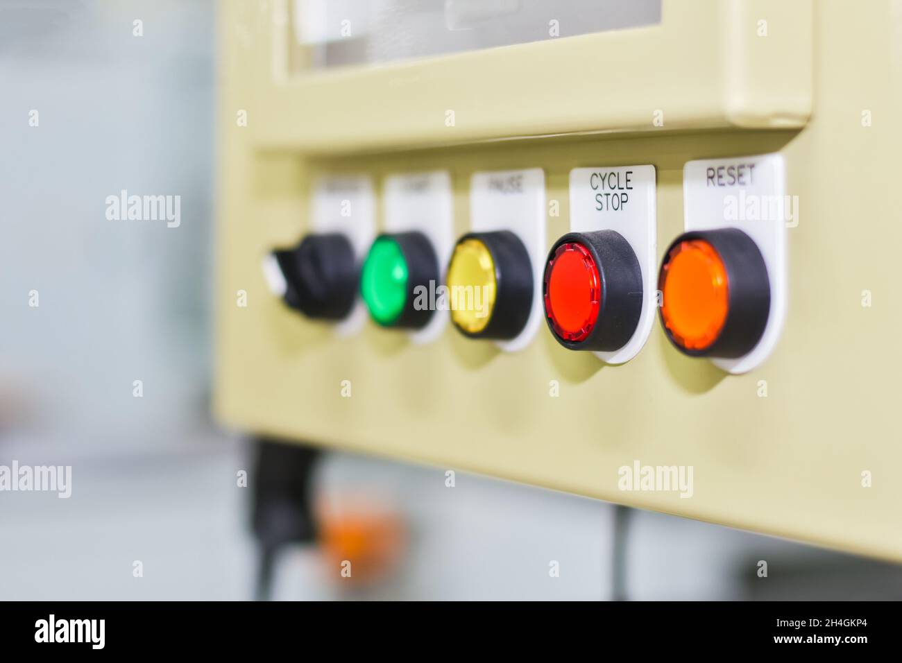 Buttons to control the operation of machines in the manufacturing ...