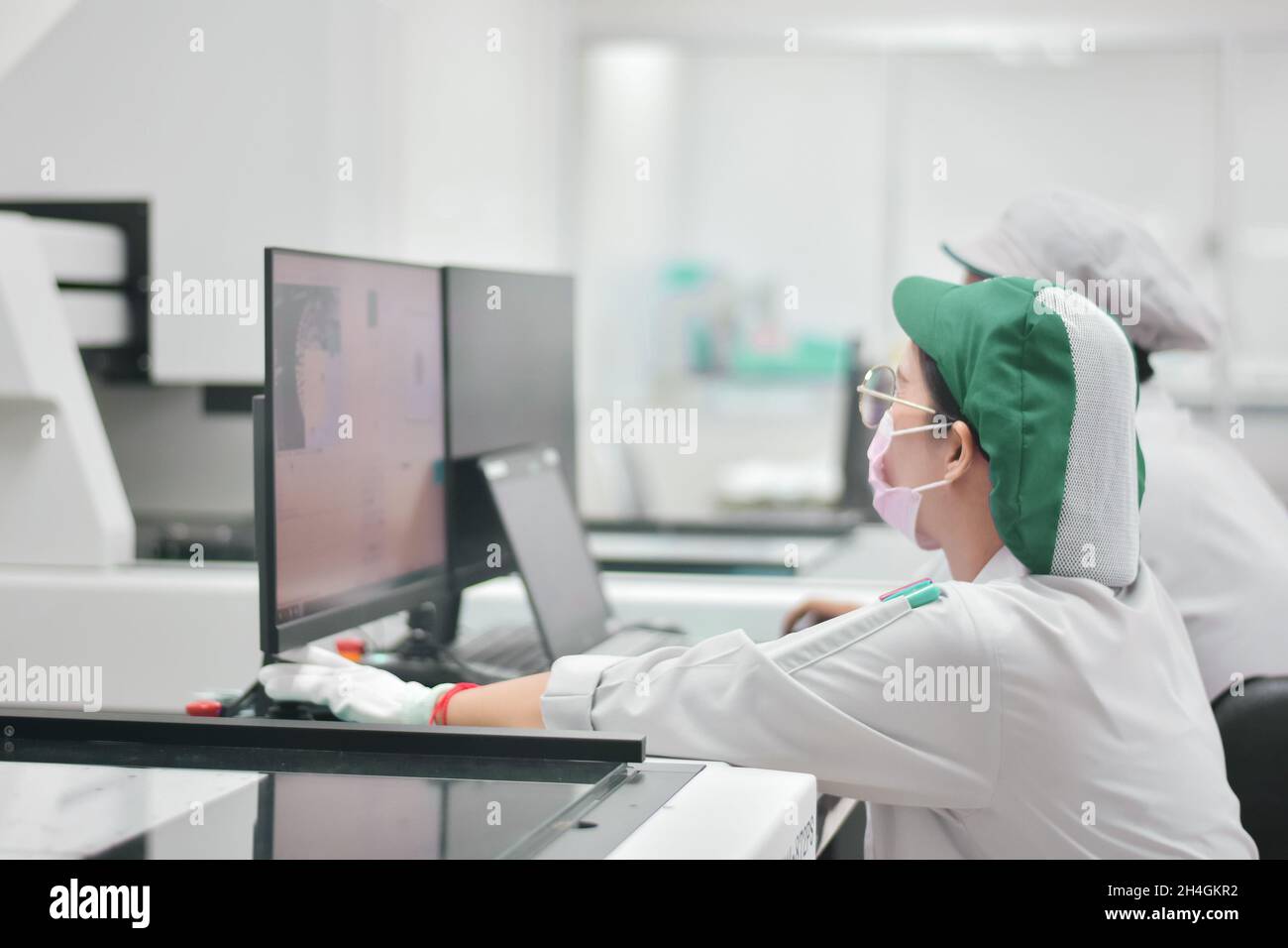 Operator working with computer design product in factory industry Stock ...