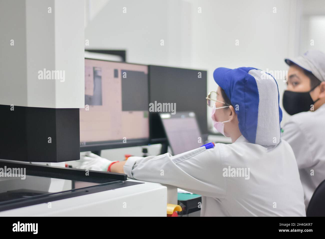 Operator working with computer design product in factory industry Stock ...