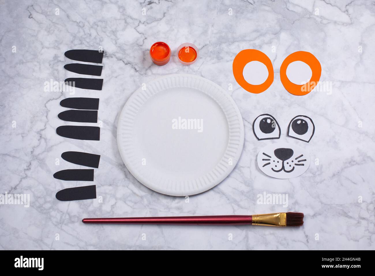 Step-by-step photo instruction on how to make a Tiger made of Paper ...
