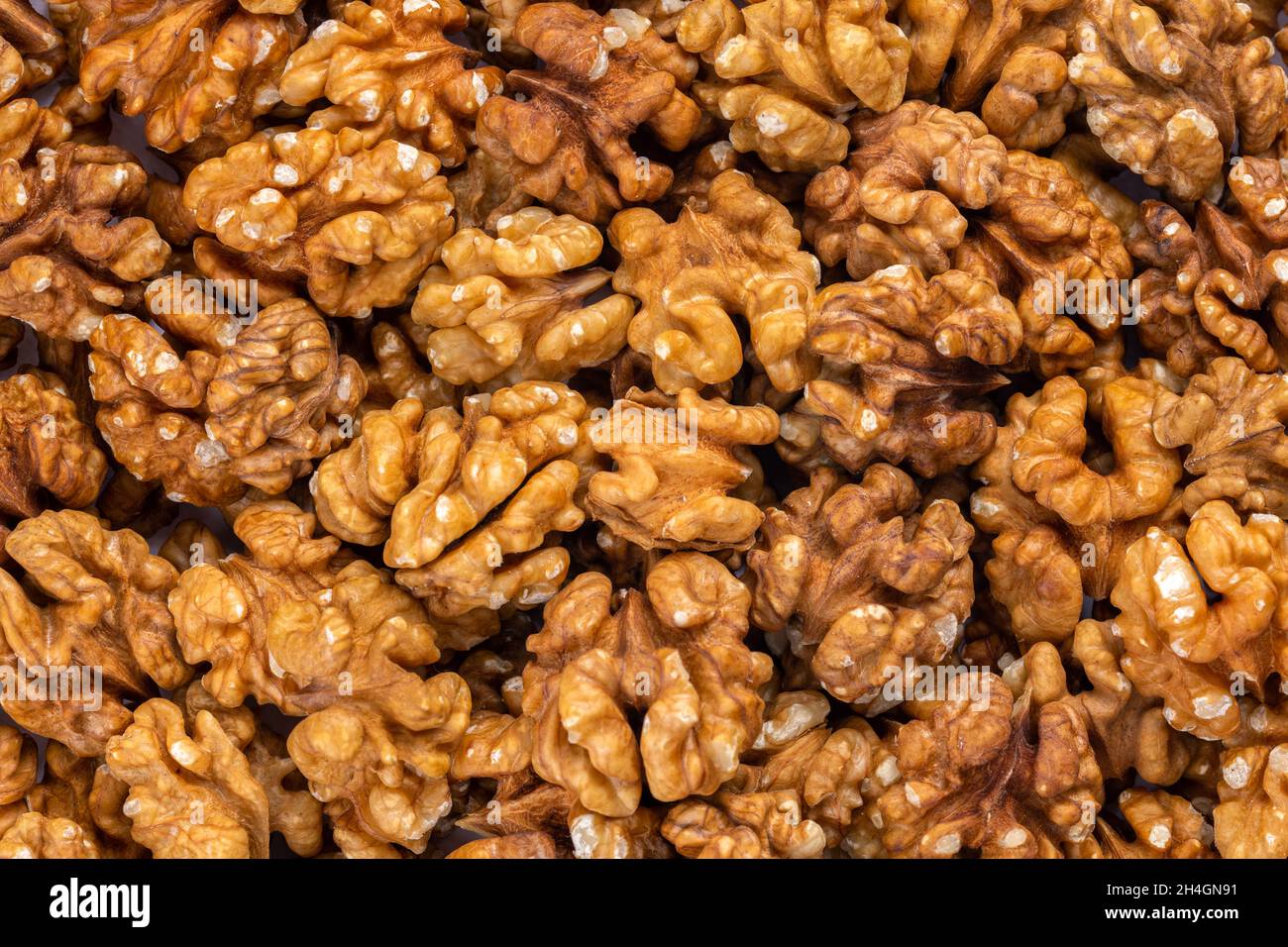 full frame close-up background of walnuts pile without shells Stock ...