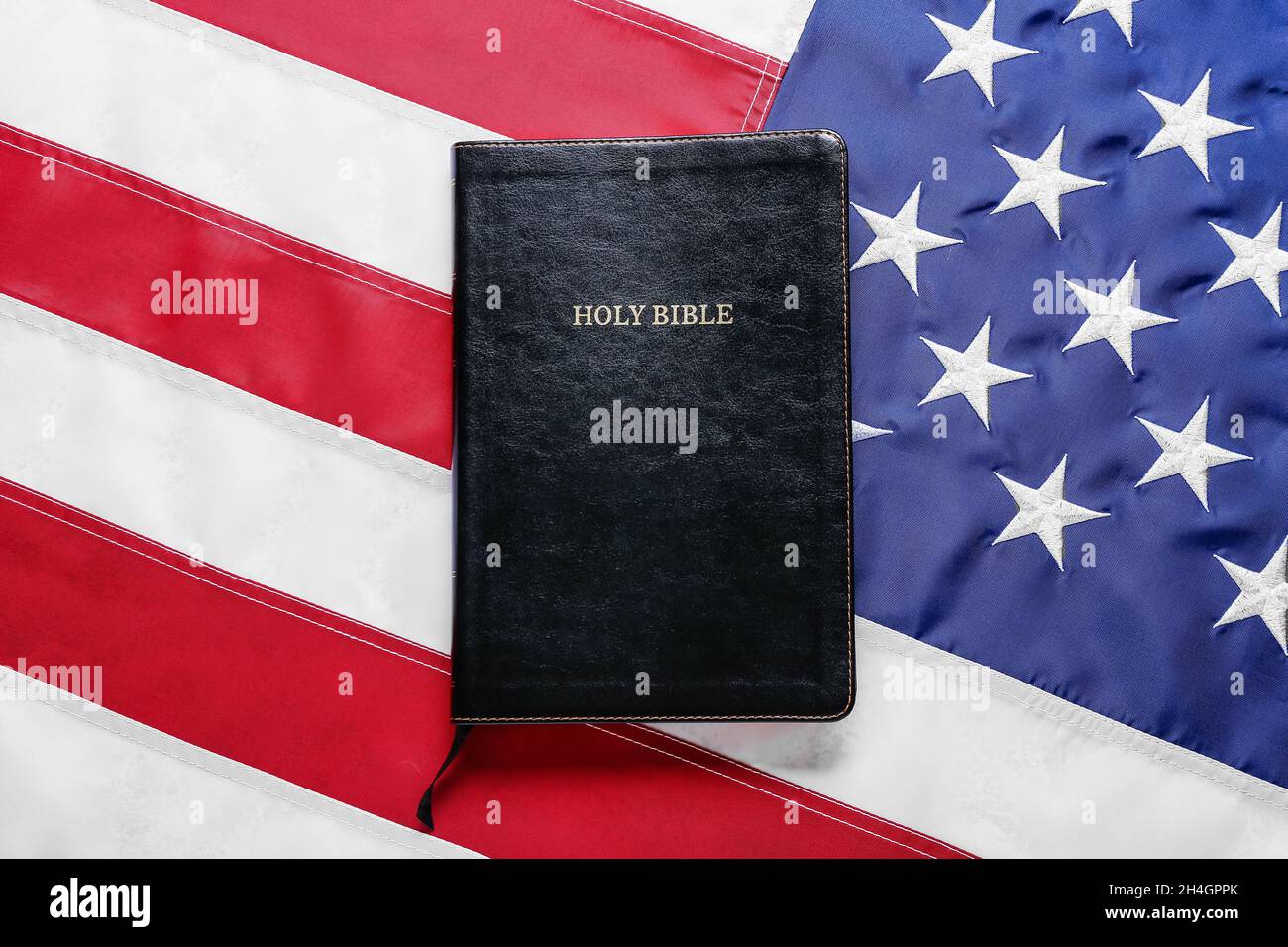 Holy Bible on flag of USA Stock Photo - Alamy