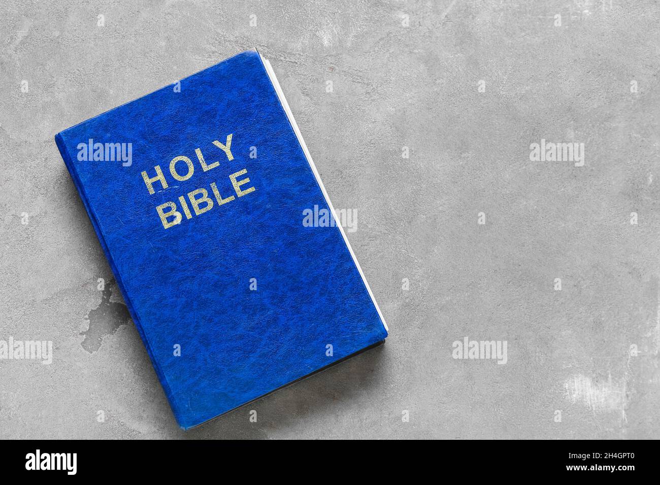 Blue Holy Bible on grunge background Stock Photo - Alamy