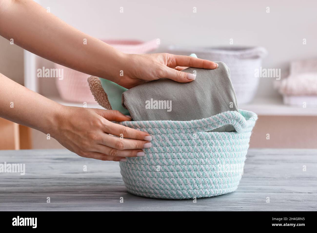 Putting table cloth on table hi-res stock photography and images - Alamy
