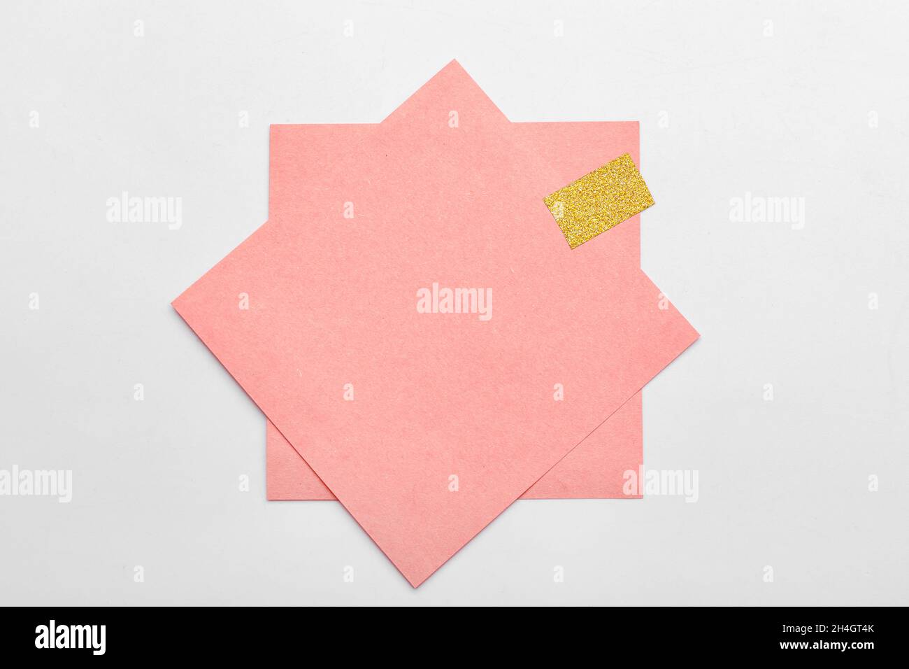 Pink sticky notes on white background Stock Photo - Alamy