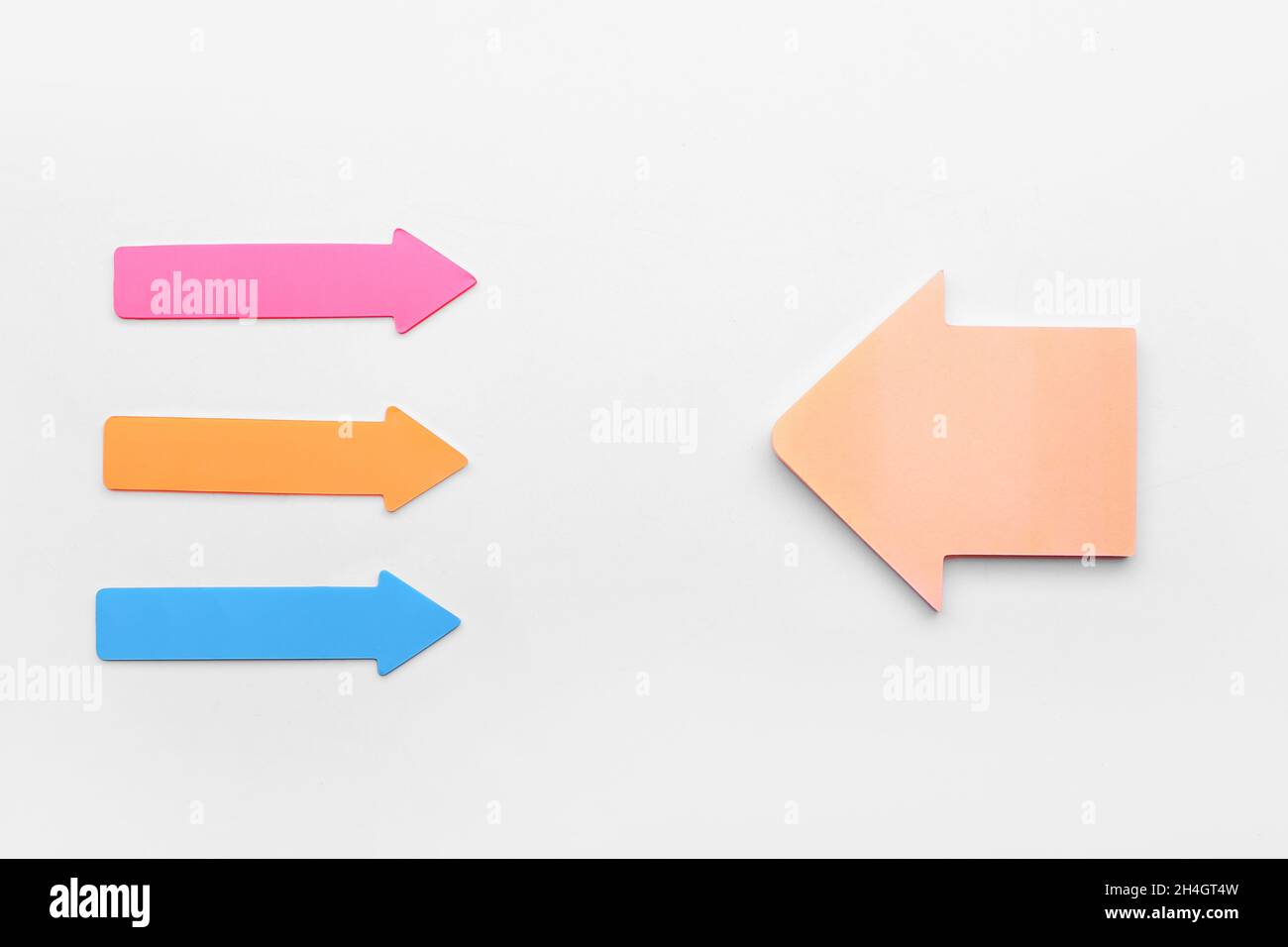 Colorful sticky notes in shape of arrows on white background Stock ...