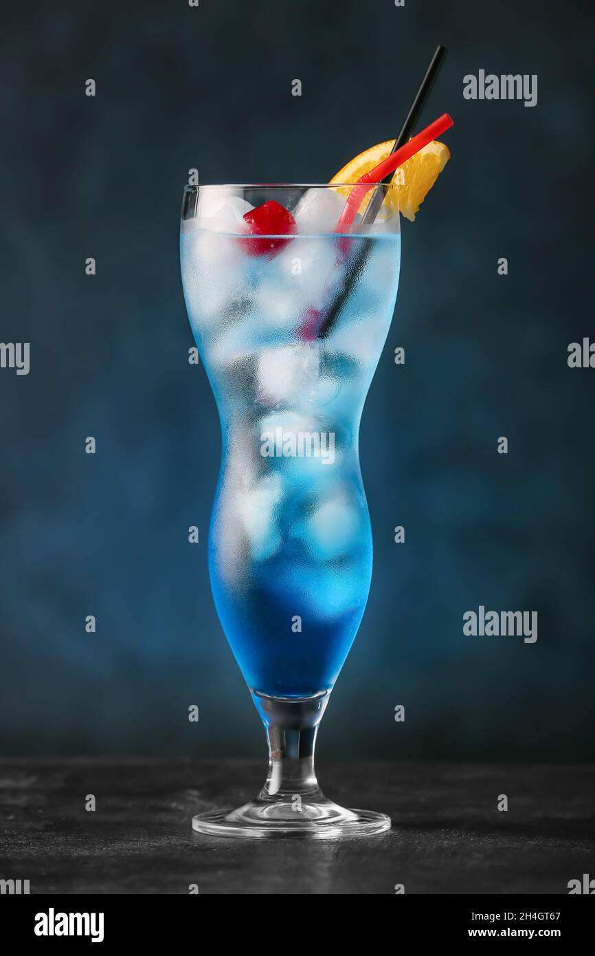 Glass of Blue Lagoon cocktail on table Stock Photo - Alamy