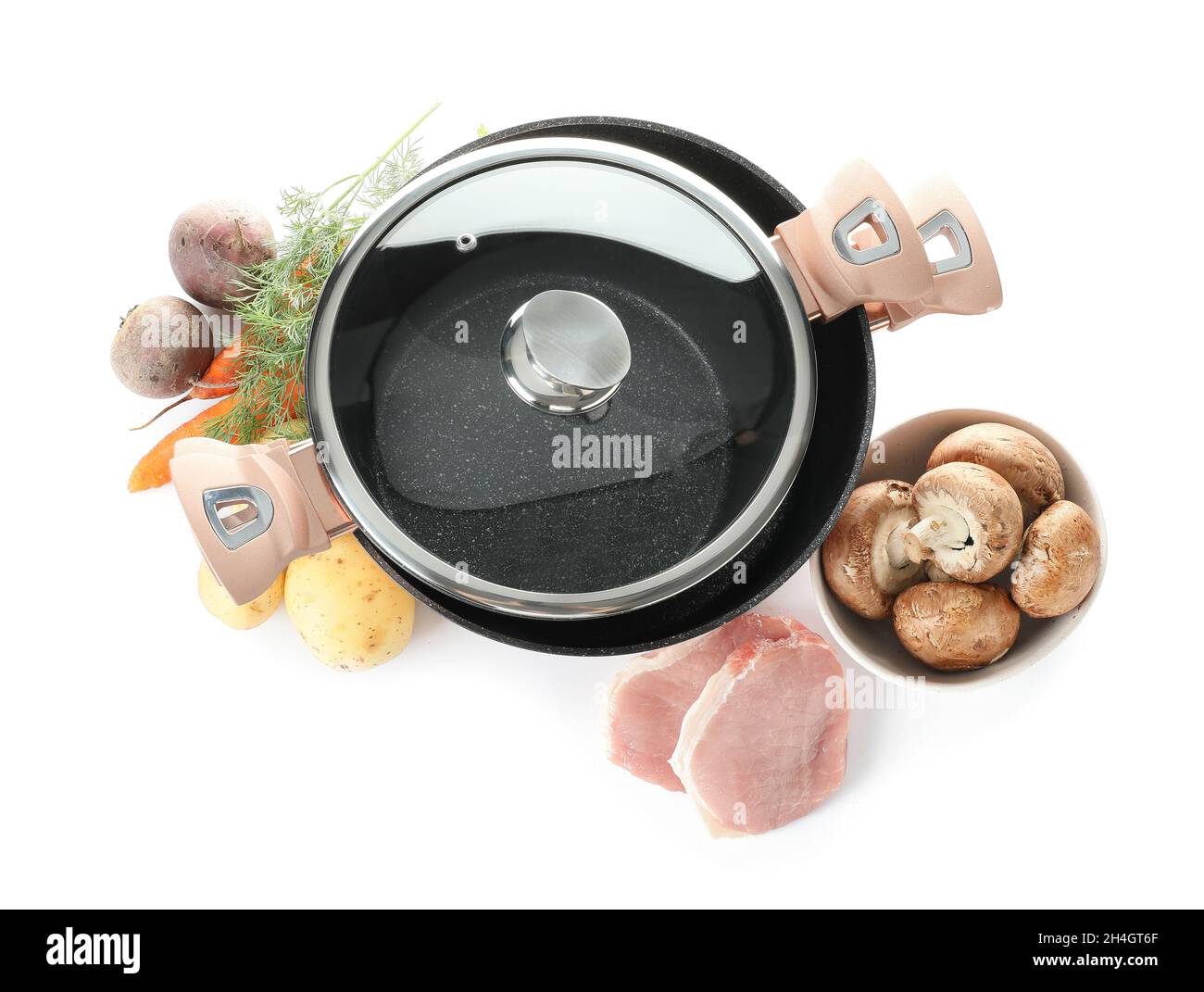 Cooking pot with vegetables on white background Stock Photo - Alamy