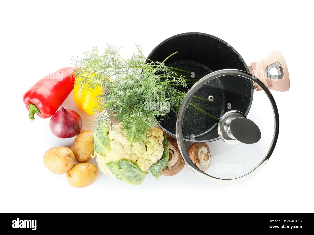 Cooking pot with vegetables on white background Stock Photo - Alamy