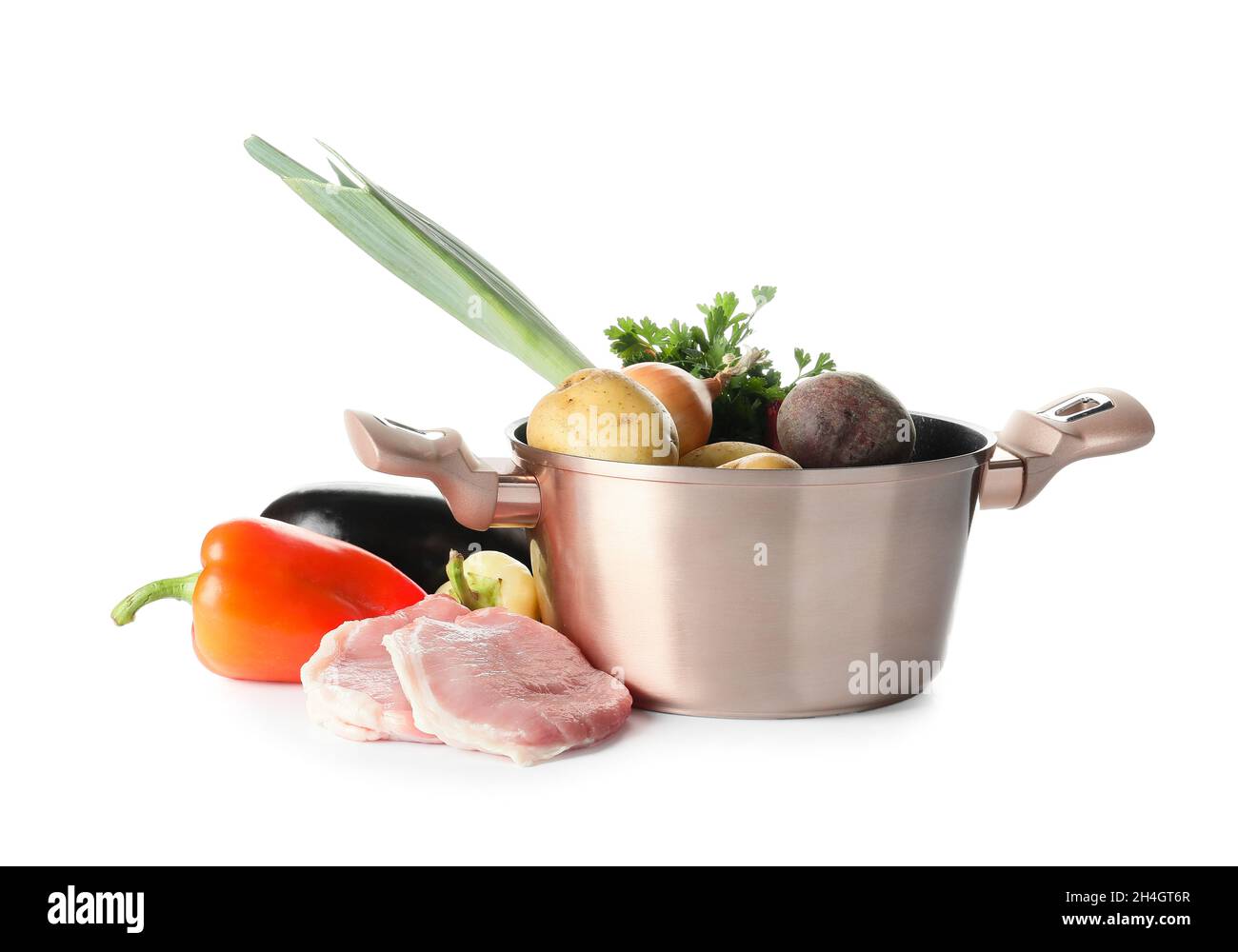 Cooking pot with vegetables on white background Stock Photo - Alamy