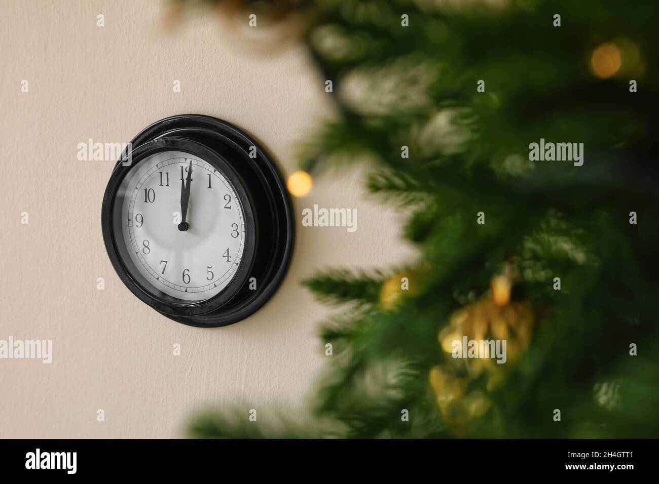 Clock hanging on tree hi-res stock photography and images - Alamy