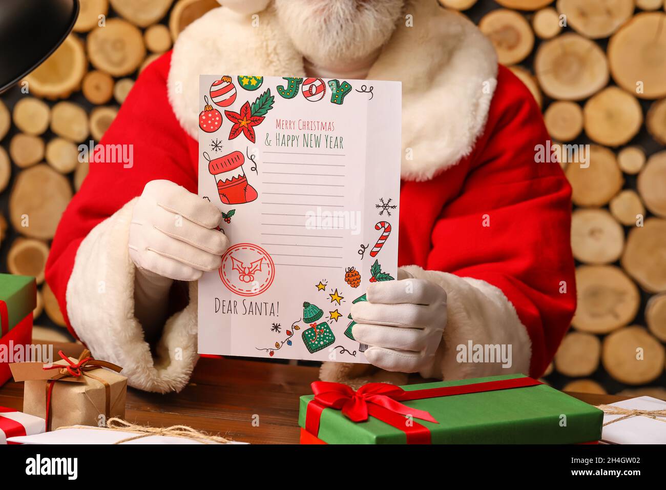 Santa Claus with empty letter at home on Christmas eve Stock Photo - Alamy