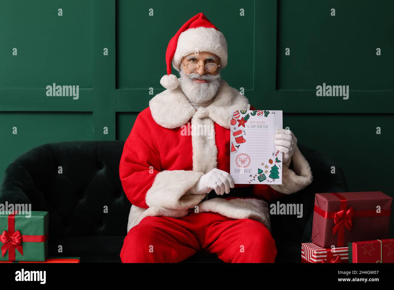Santa Claus with empty letter at home on Christmas eve Stock Photo - Alamy