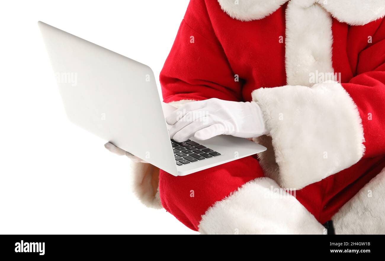 Santa Claus with modern laptop on white background Stock Photo - Alamy