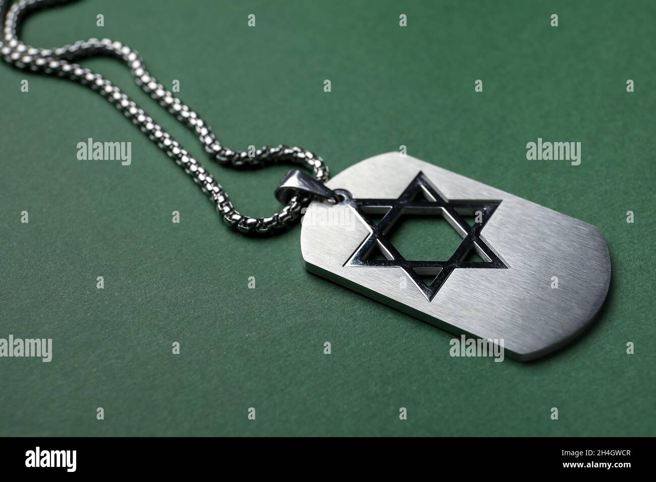 Military tag of Israeli soldier on color background Stock Photo - Alamy