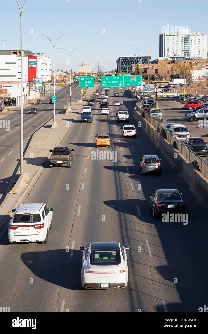 Traffic on the Trans Canada Highway (16th Avenue) driving through the ...