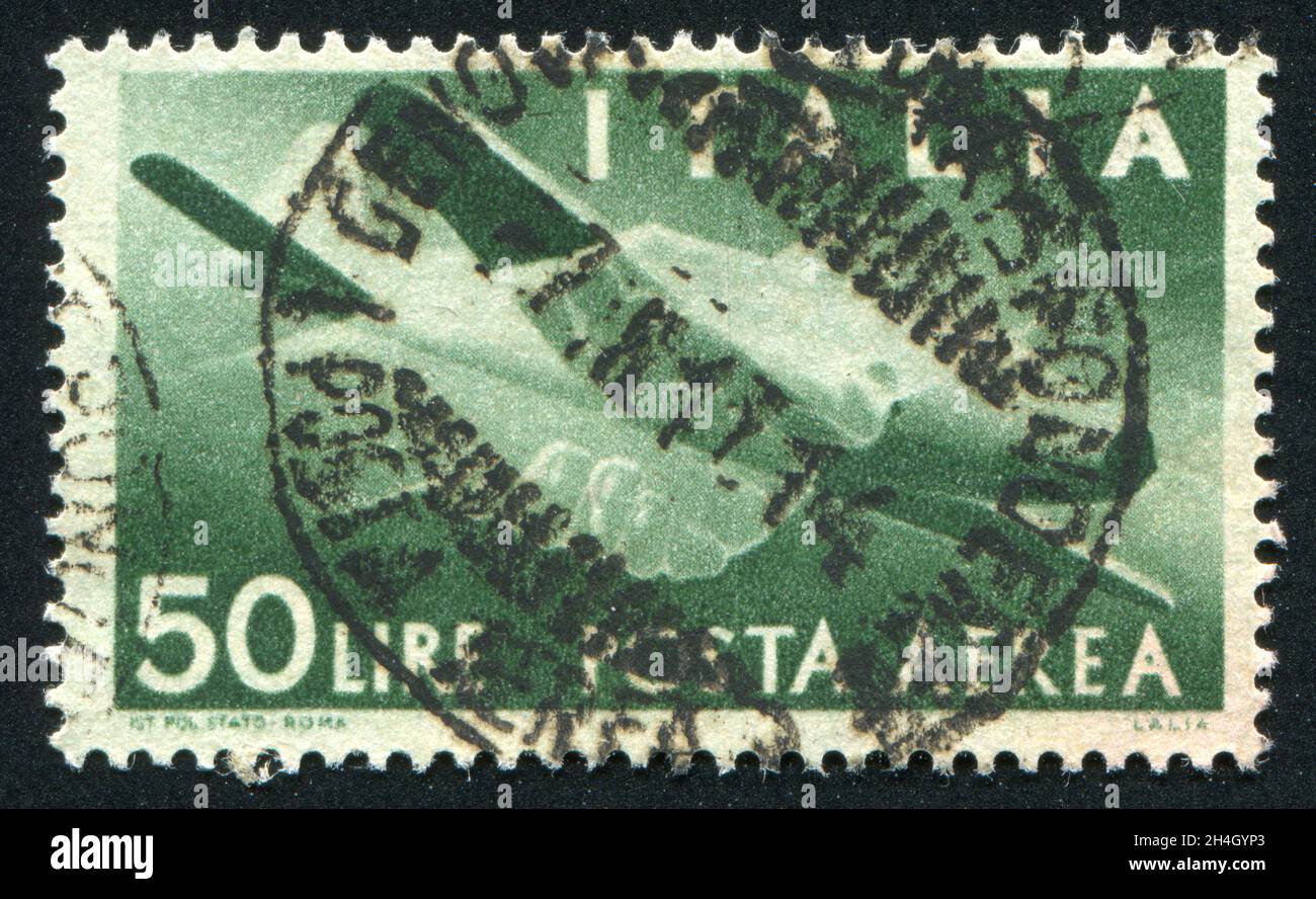 ITALY - CIRCA 1945: stamp printed by Italy, shows Plane and Clasped ...