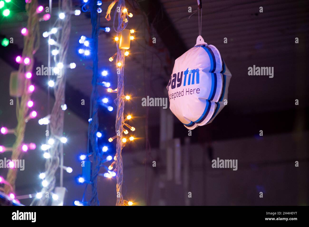 diwali string lights of various colors along with a Paytm dangler ...
