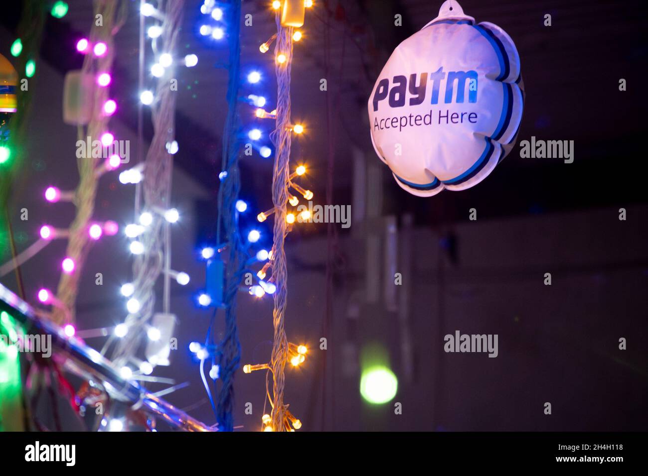 diwali string lights of various colors along with a Paytm dangler ...