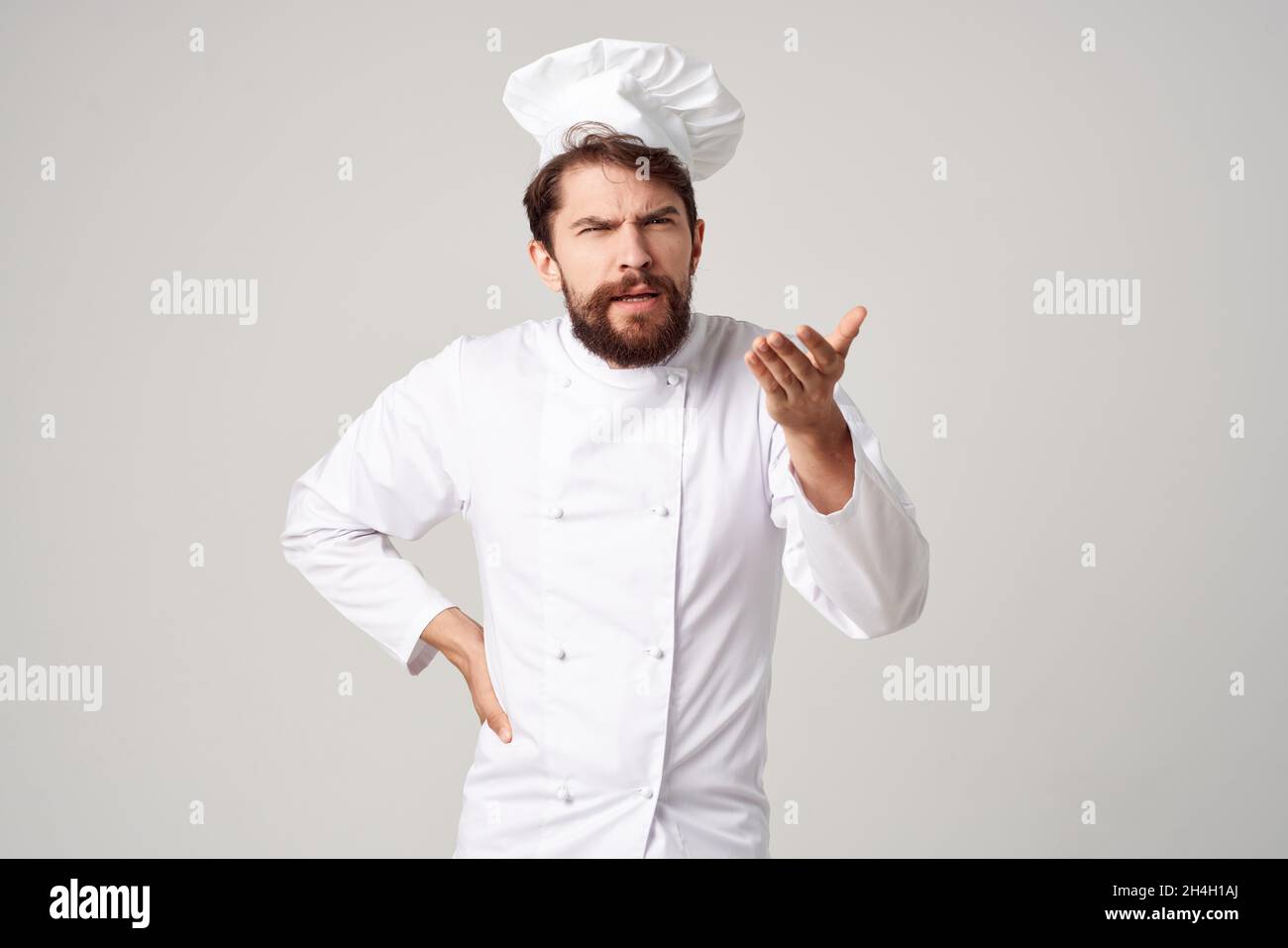 male cook kitchen Job hand gestures light background Stock Photo - Alamy