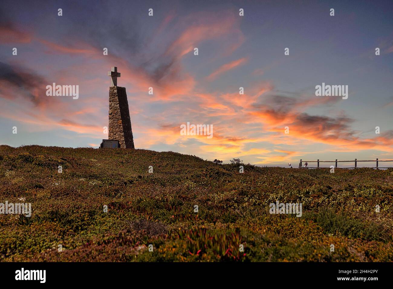 Monument with stone cross marks westernmost point of the continent of ...