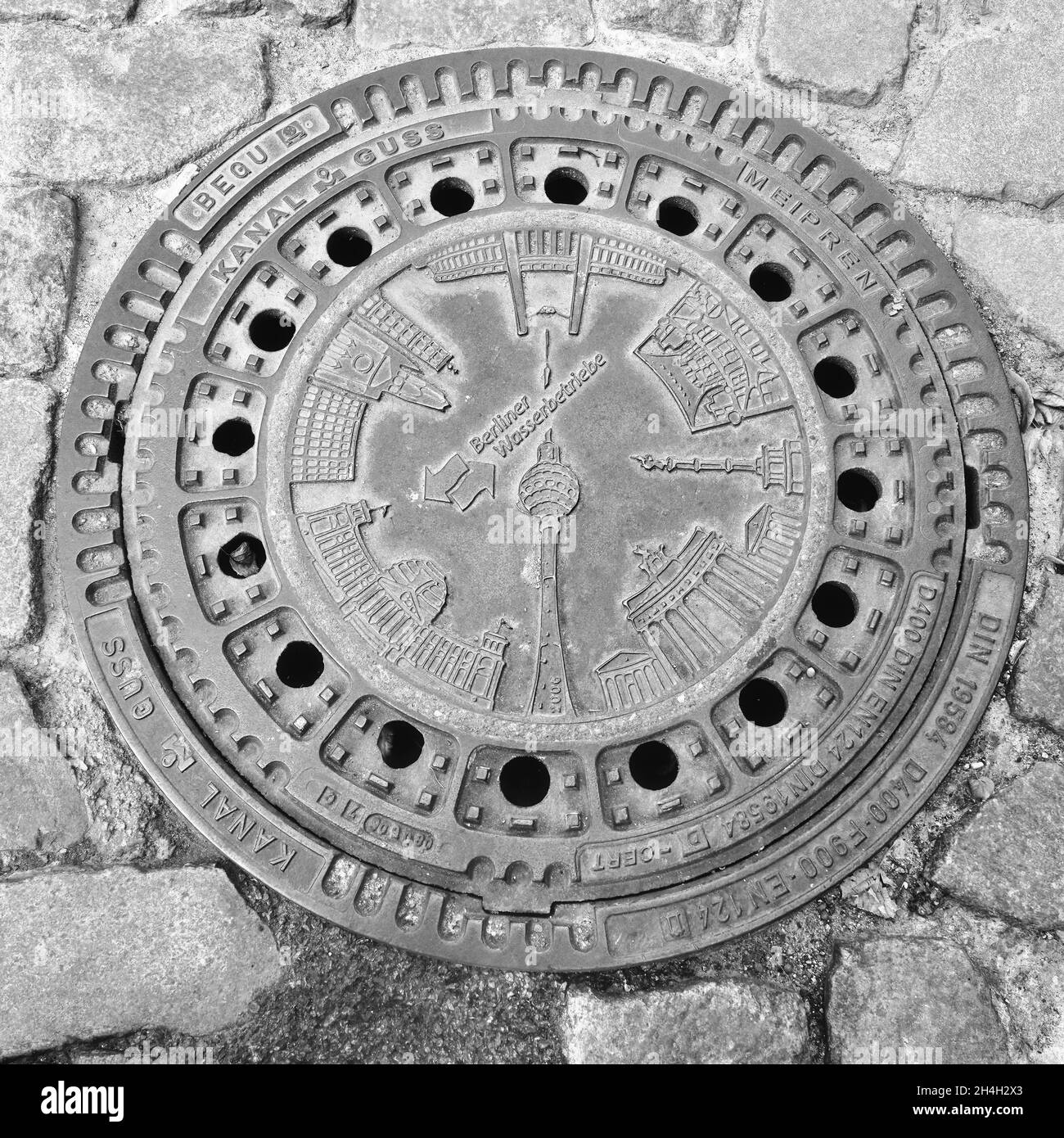 Manhole cover germany Black and White Stock Photos & Images - Alamy