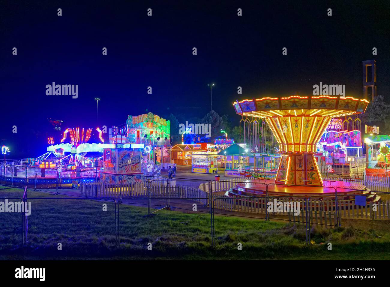 Night fun fair lit up bright lights clydebank town centre Stock Photo ...