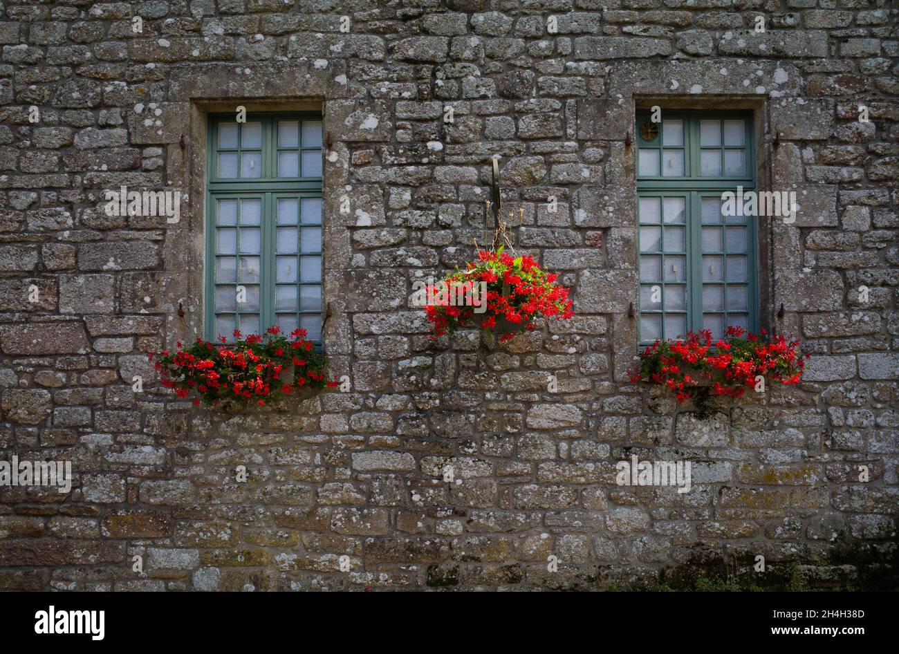 Window with floral decorations, Locronan (Lokorn), Finistere, Brittany ...