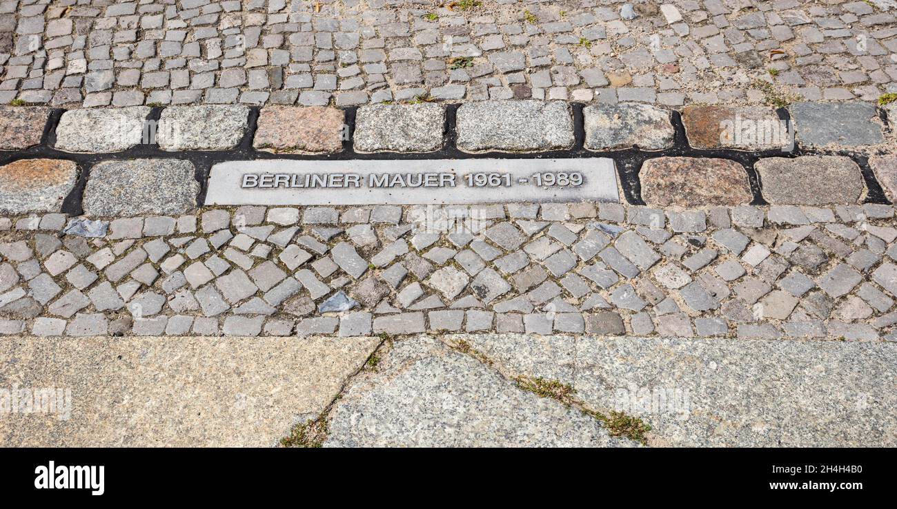 Sign, Berlin Wall 1961-1989, paving, former course of the Wall, Berlin ...