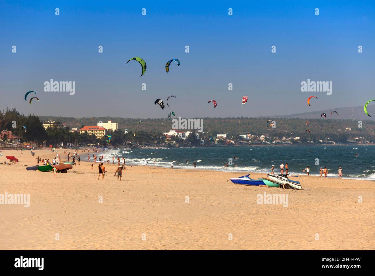 Kite surfing on the beach, at Saigon Mui Ne Resort, Mui Ne, Vietnam ...